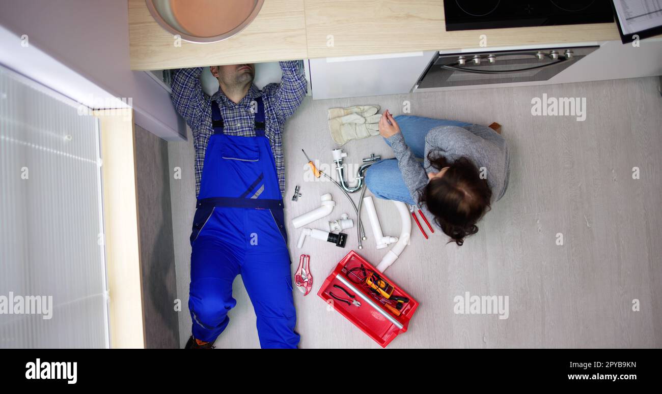 Kitchen Pipe Plumbing Damage Problem Stock Photo - Alamy