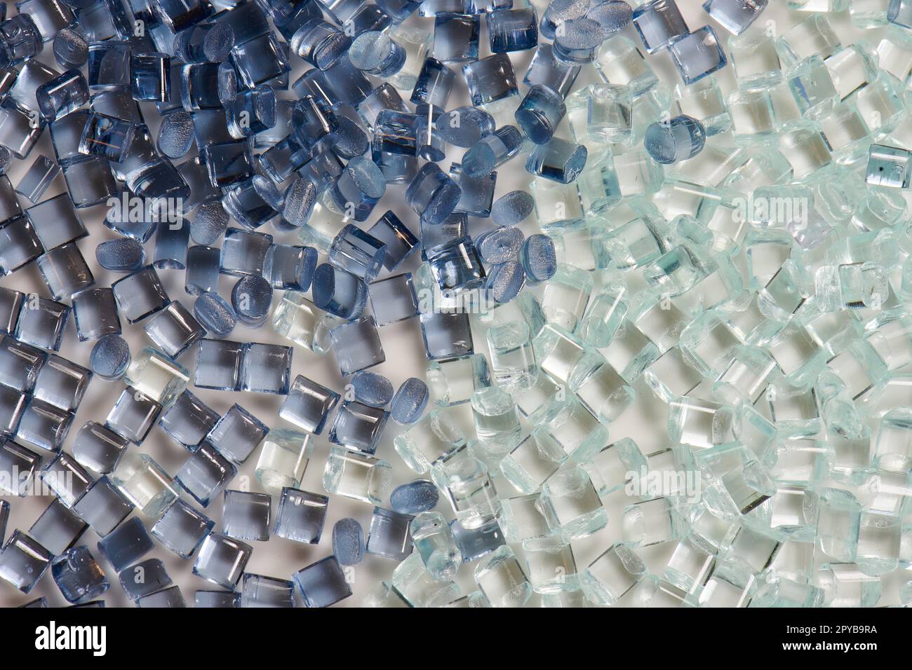 light blue colored and crystal clear transparent polymer resins in ...