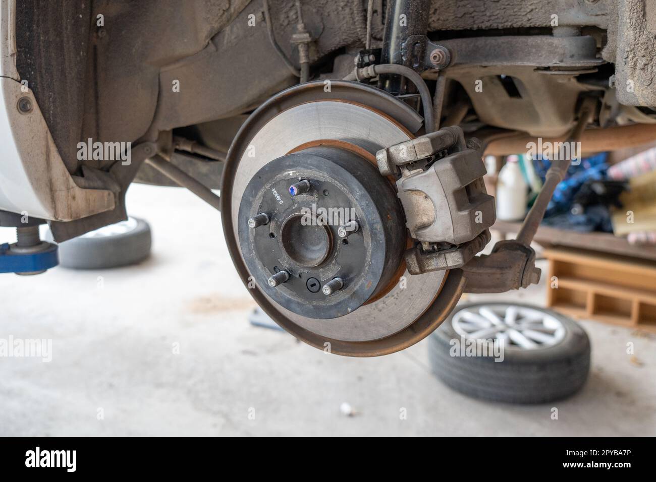 Car front disc break being checked and inspected for safety Stock Photo ...