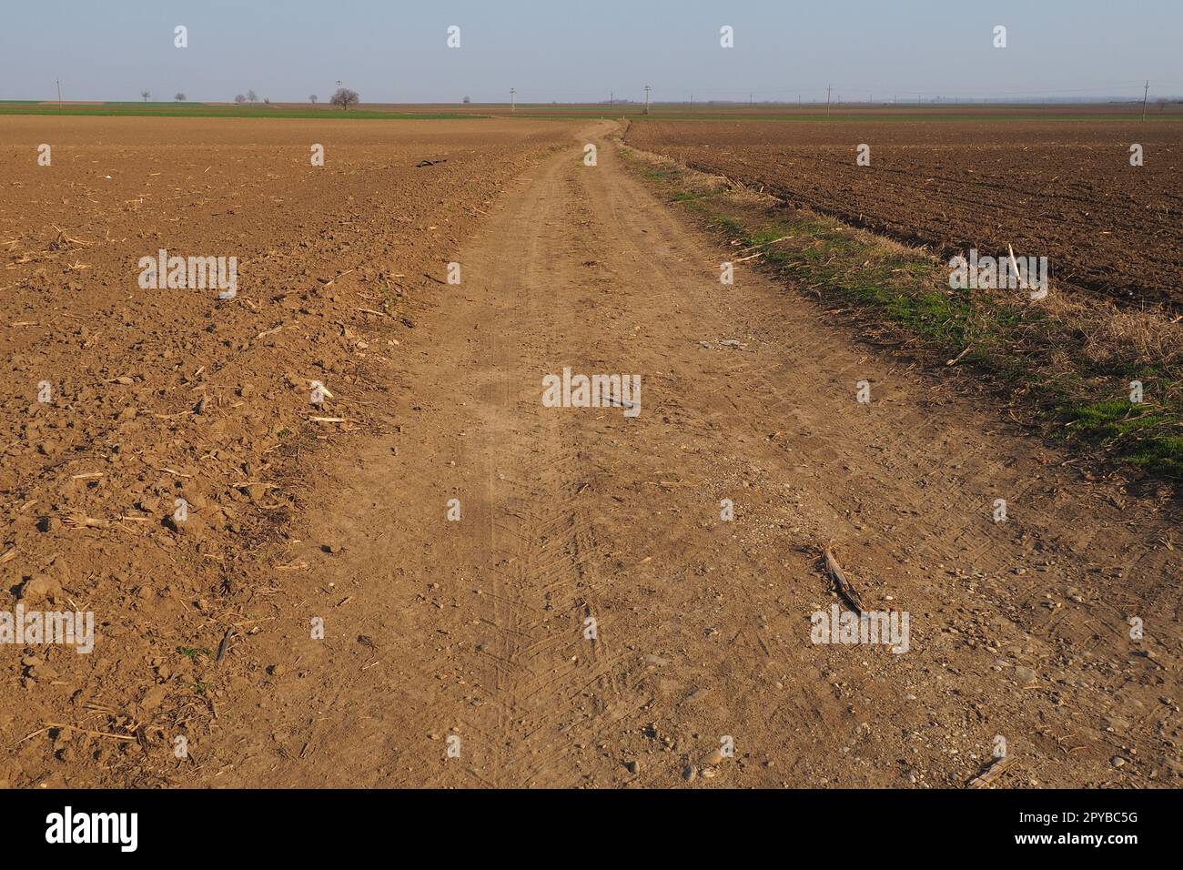 Arable field ready for spring agricultural work. Furrows from the ...