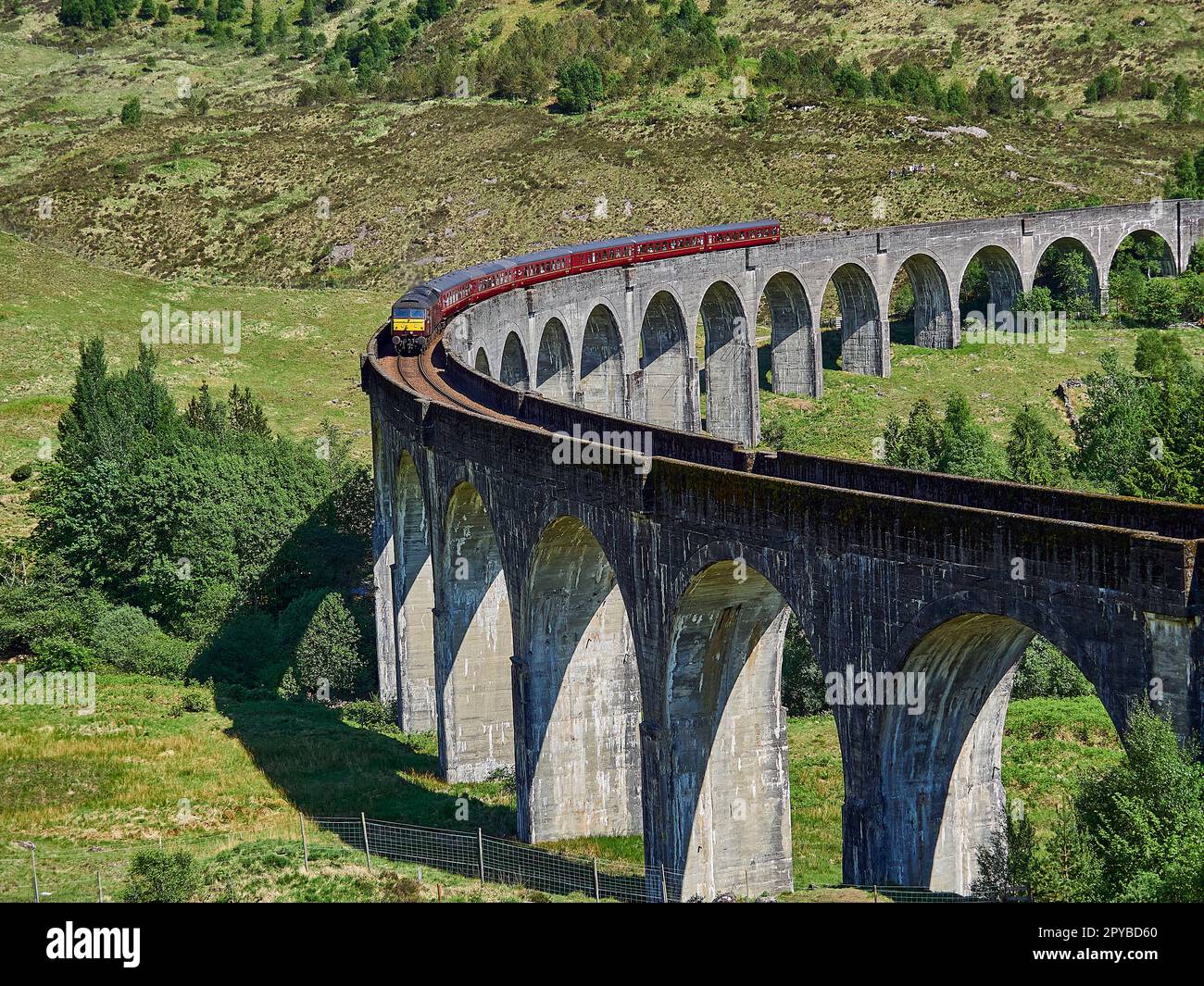 Glenfinnan, Scotland - 05 29 2018: iconic jacobite steam train crossing ...