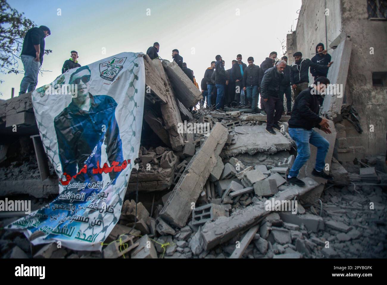 Salfit, Palestine. 03rd May, 2023. Palestinians inspect the ruins of ...
