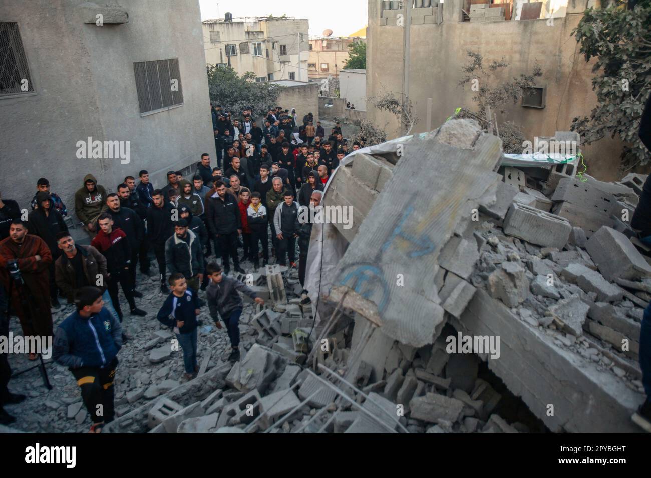Salfit, Palestine. 03rd May, 2023. Palestinians inspect the ruins of ...