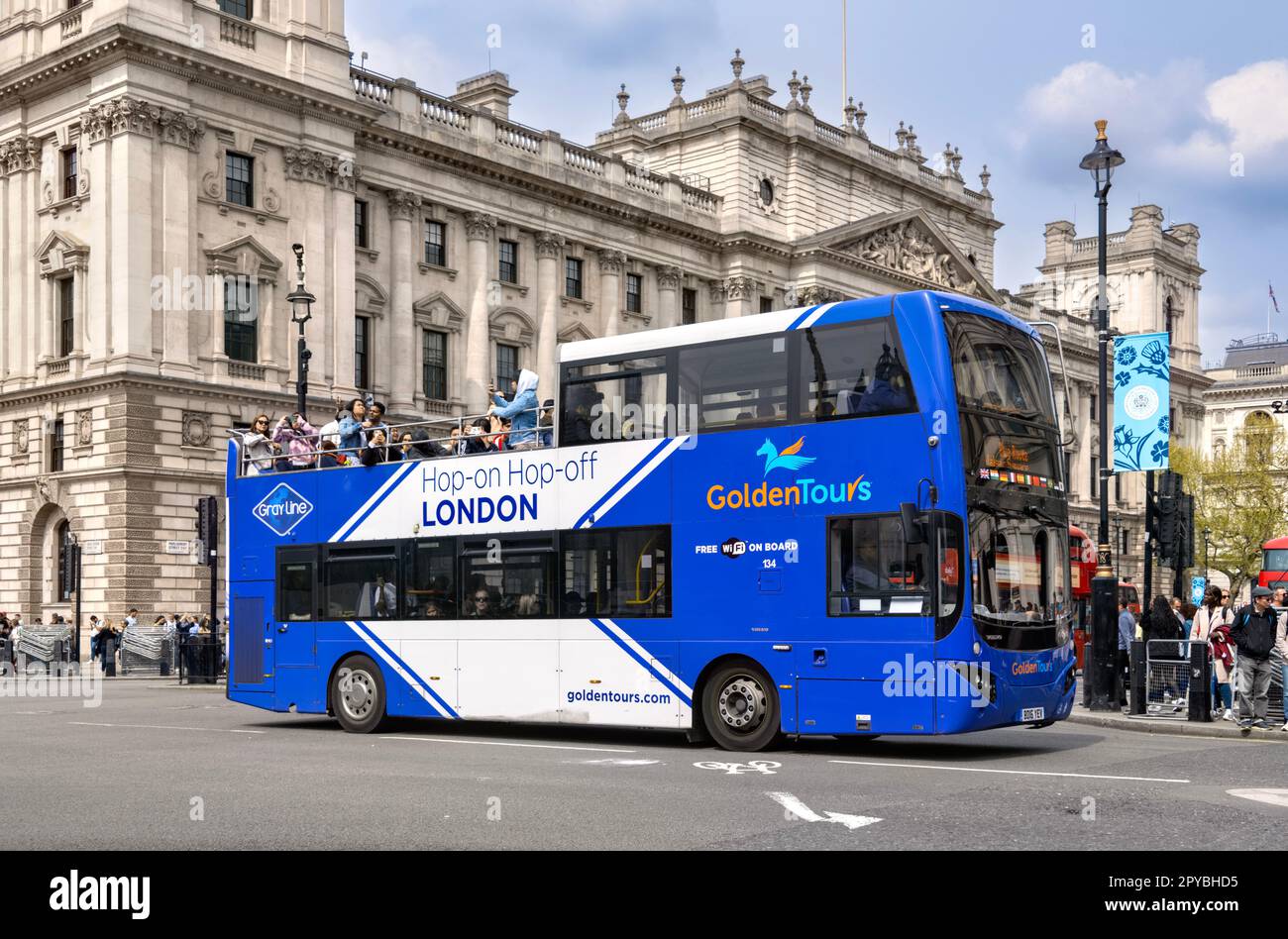 Blue Hop on Hop Off Bus, London UK Stock Photo - Alamy