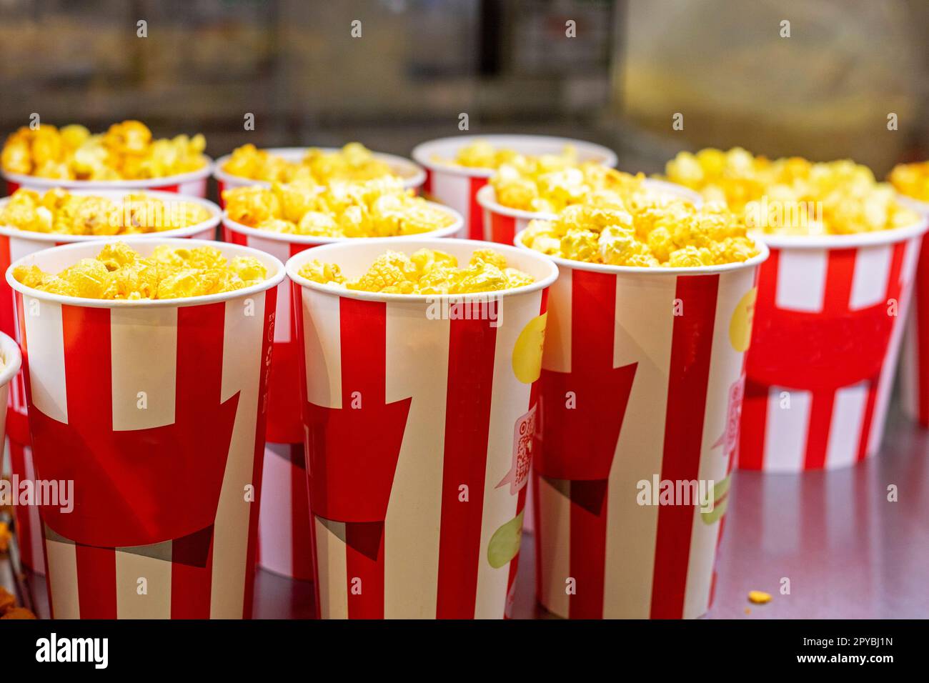 different flavors of popcorn in the package before watching a movie ...
