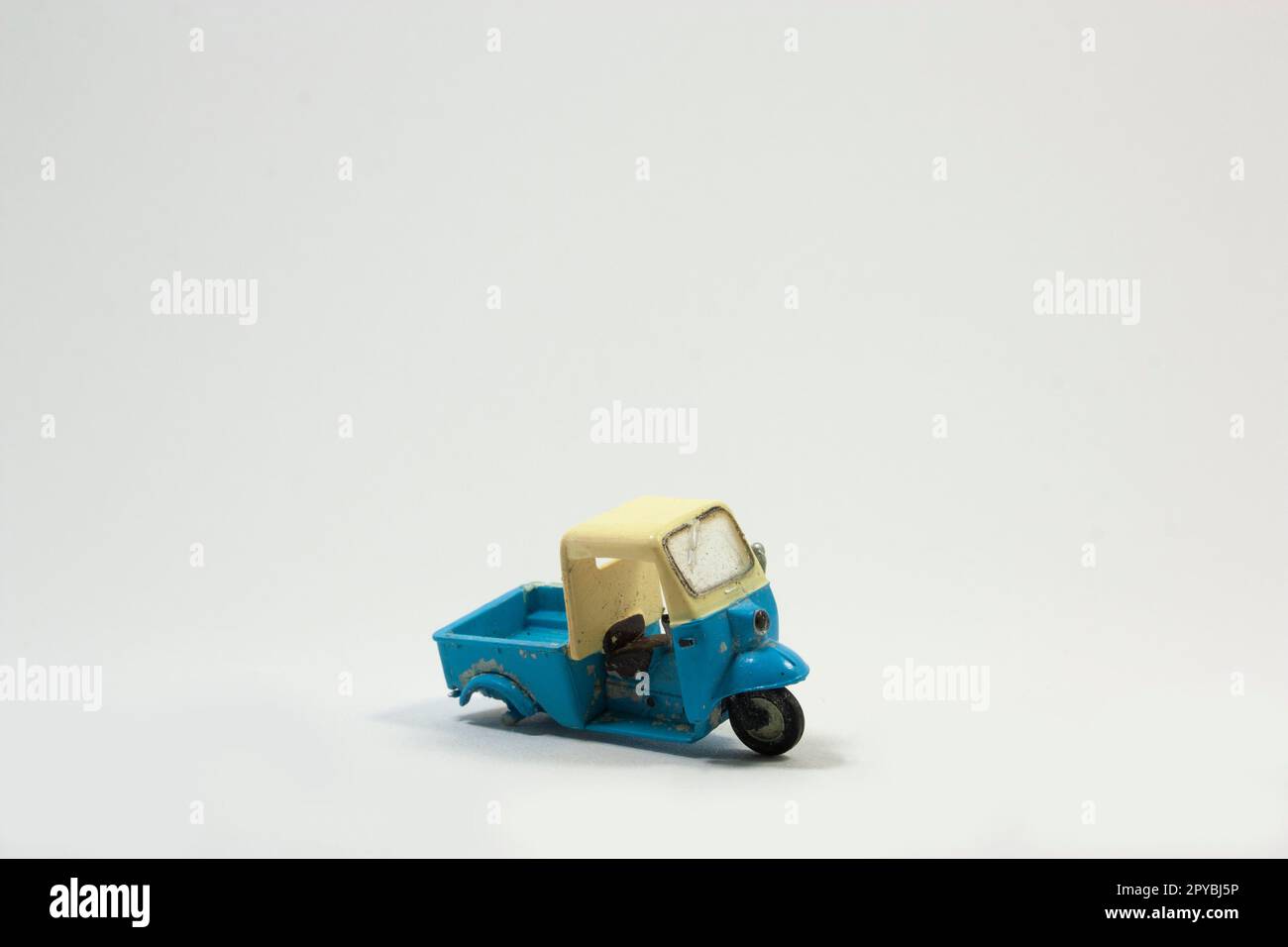 tricycle toy worthless on white background Stock Photo - Alamy
