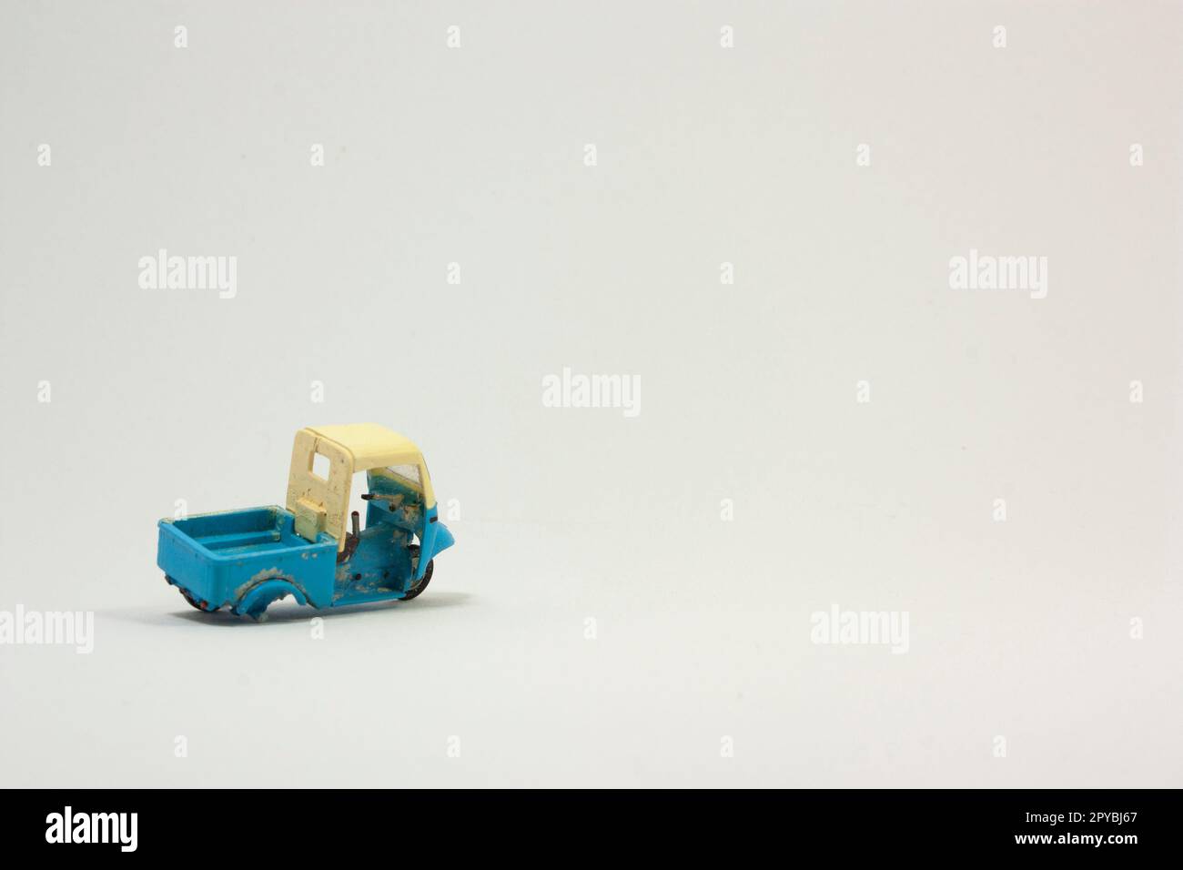 tricycle toy worthless on white background Stock Photo - Alamy