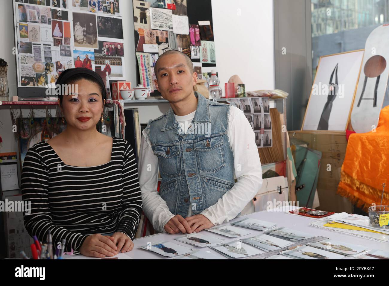 Yat Pit fashion designers Onying Lai (L) and Jason Mui are pictured at ...