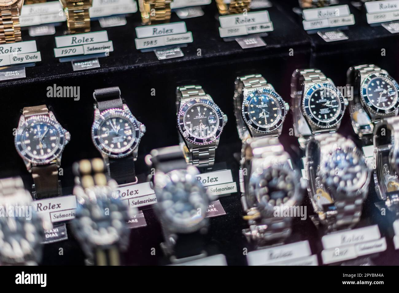 Rolex watches lined up he shop window Stock Photo - Alamy