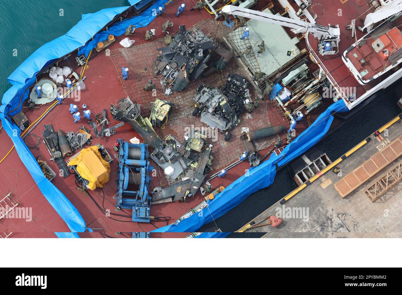 An aerial photo shows the wreckage of a sunken helicopter of the Japan ...