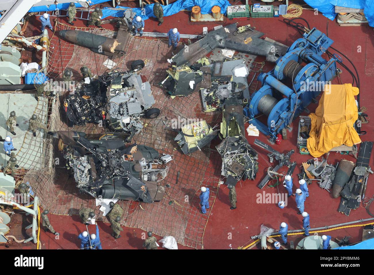 An aerial photo shows the wreckage of a sunken helicopter of the Japan ...
