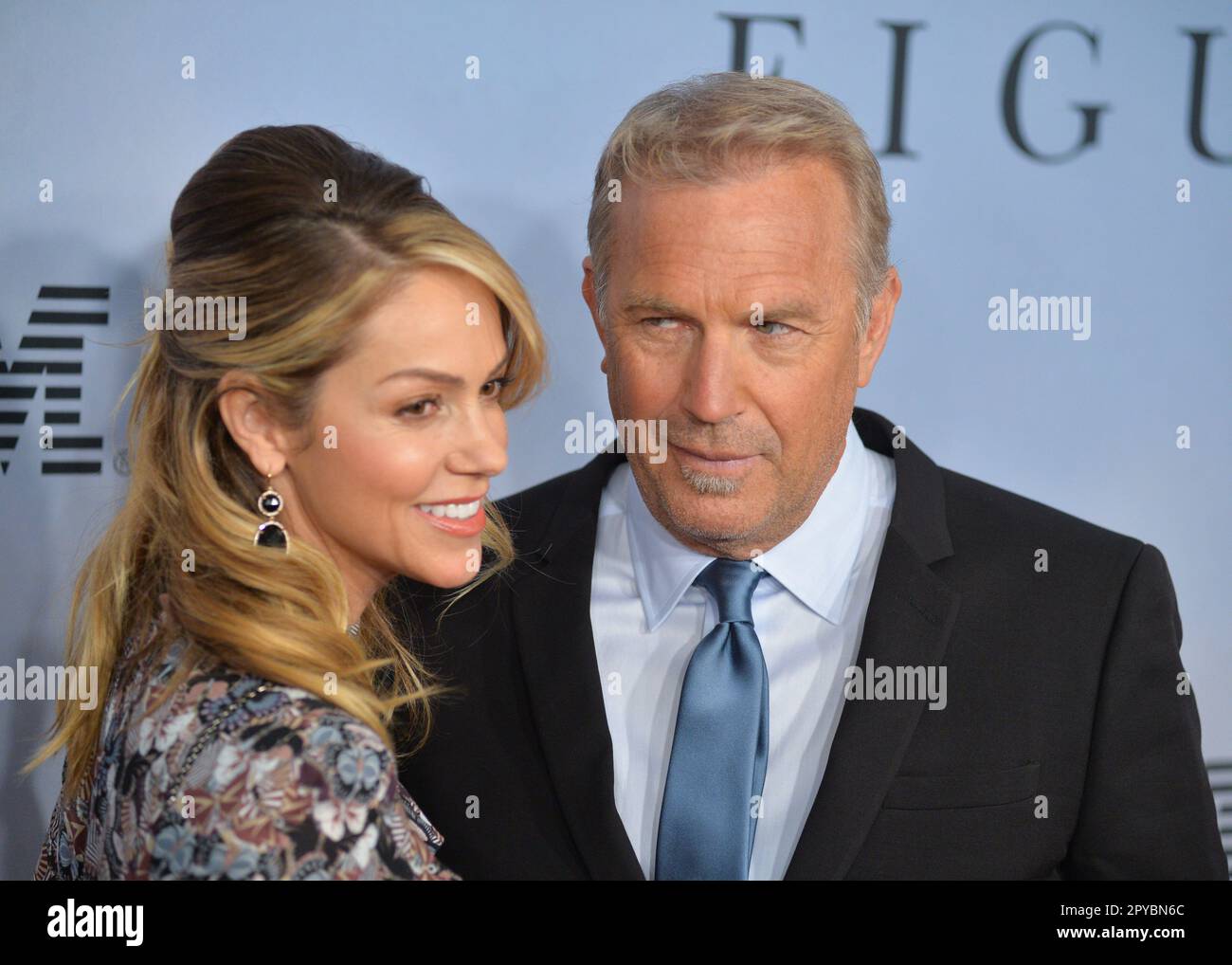 Christine Baumgartner and Kevin Costner attend the "Hidden Figures" New ...