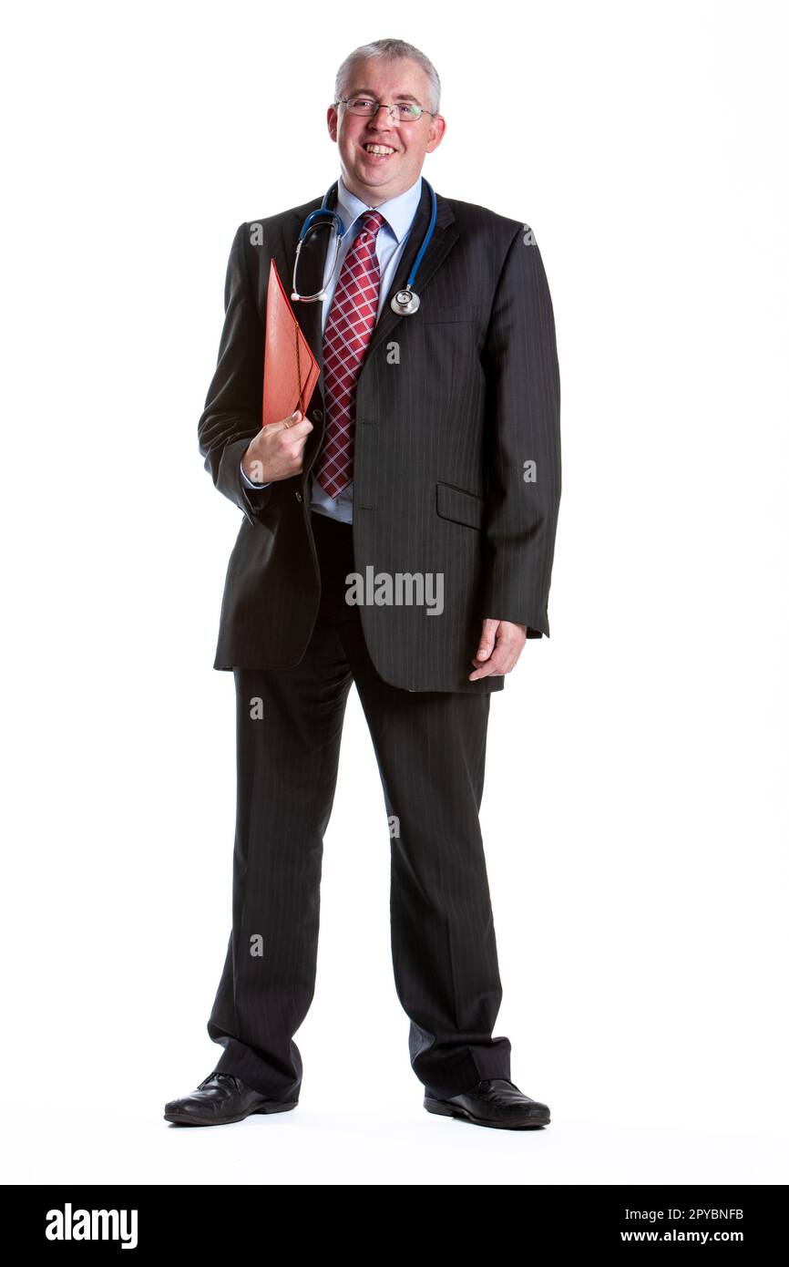 Health Professionals: Smiling Doctor. Full length studio portrait of a ...