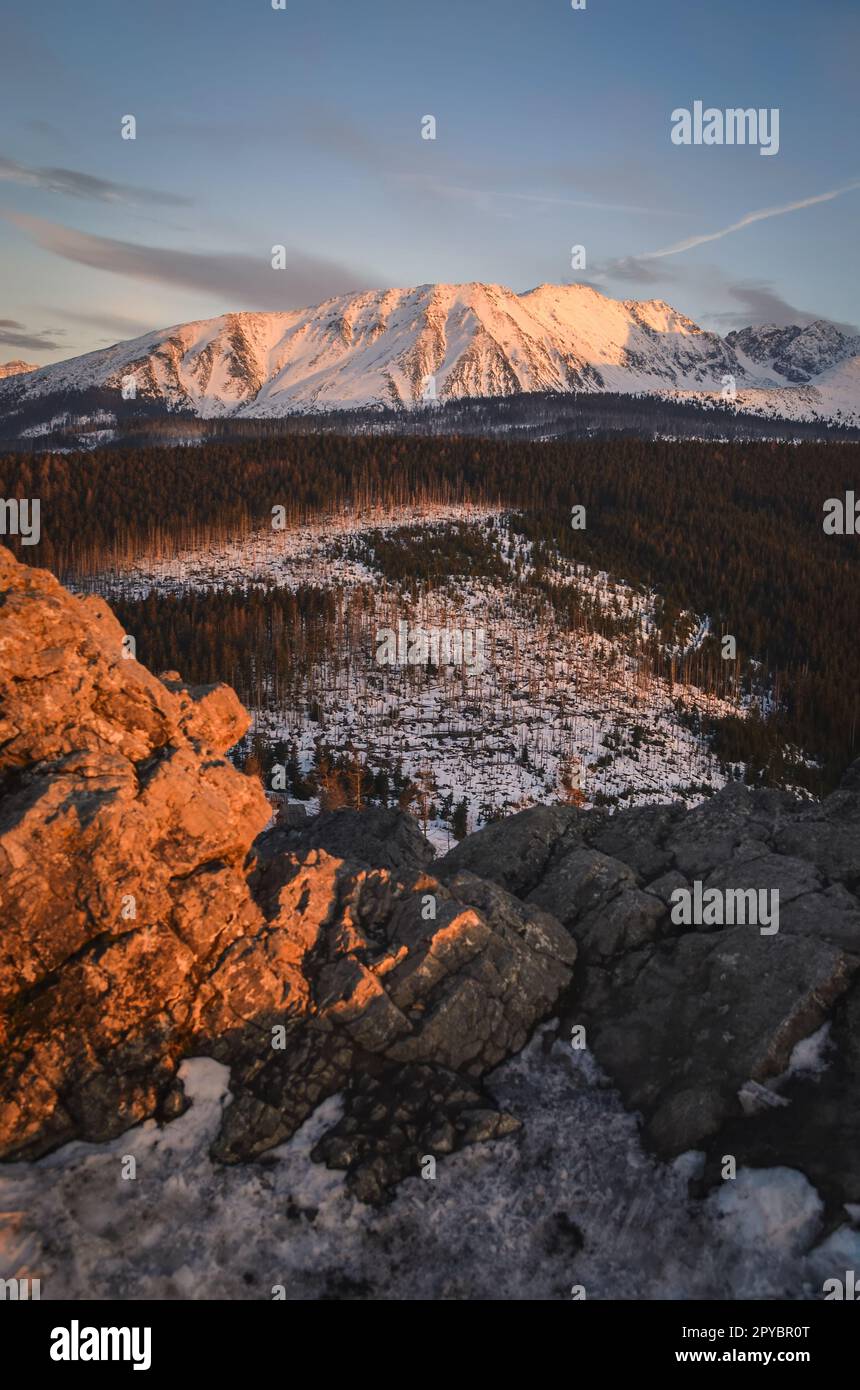 Beautiful early spring mountain landscape. View of the snow-white peaks in the Polish Tatra ...