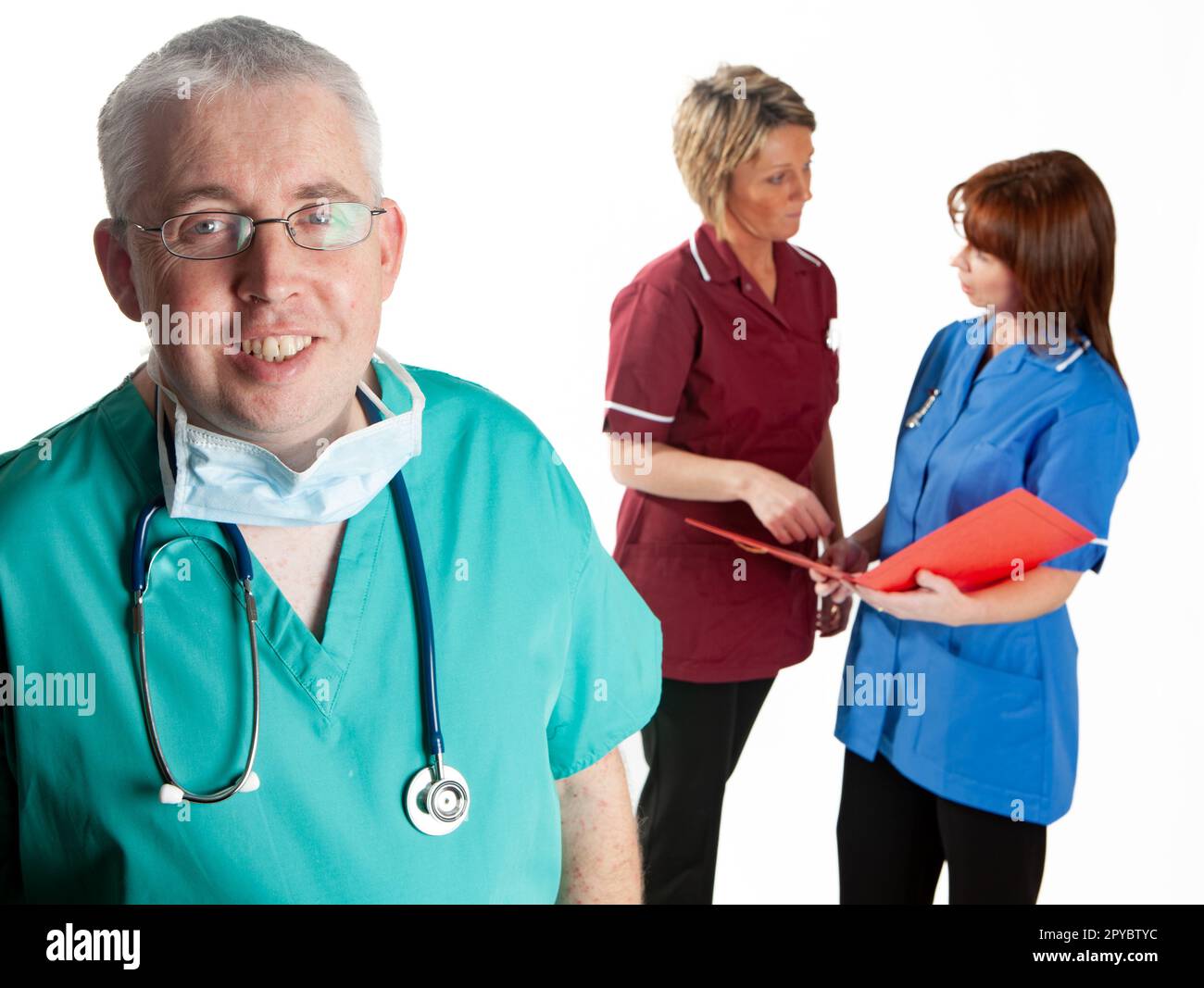 Health Professionals: Medical Consultation. A foreground doctor with ...