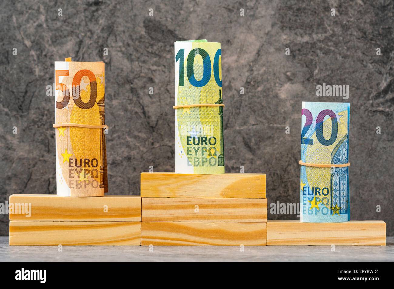 Pedestal or platform with rolls of Euro notes for honoring prize ...