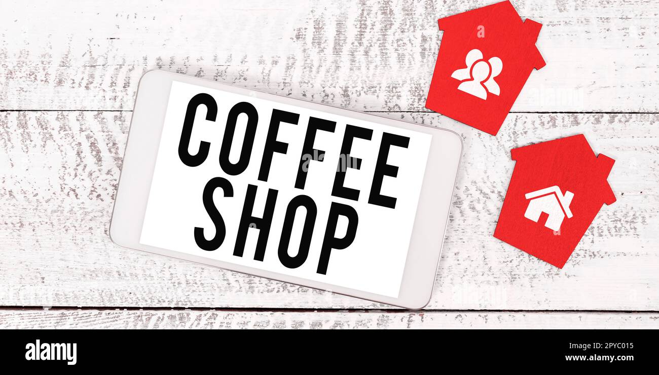 Sign displaying Coffee Shop. Word Written on small informal restaurant ...