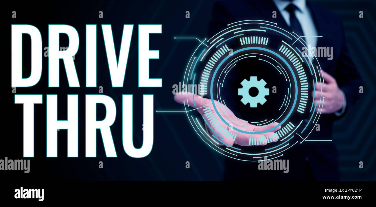 Sign displaying Drive Thru. Internet Concept place where you can get ...