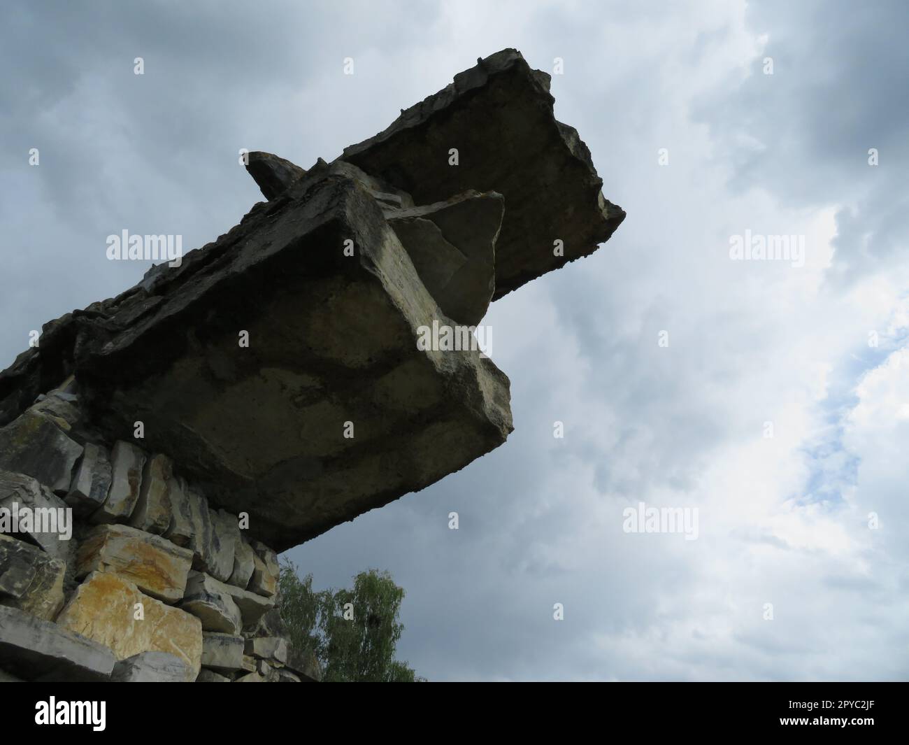 beautiful dragon-shaped stone wall coming out of the earth Stock Photo ...