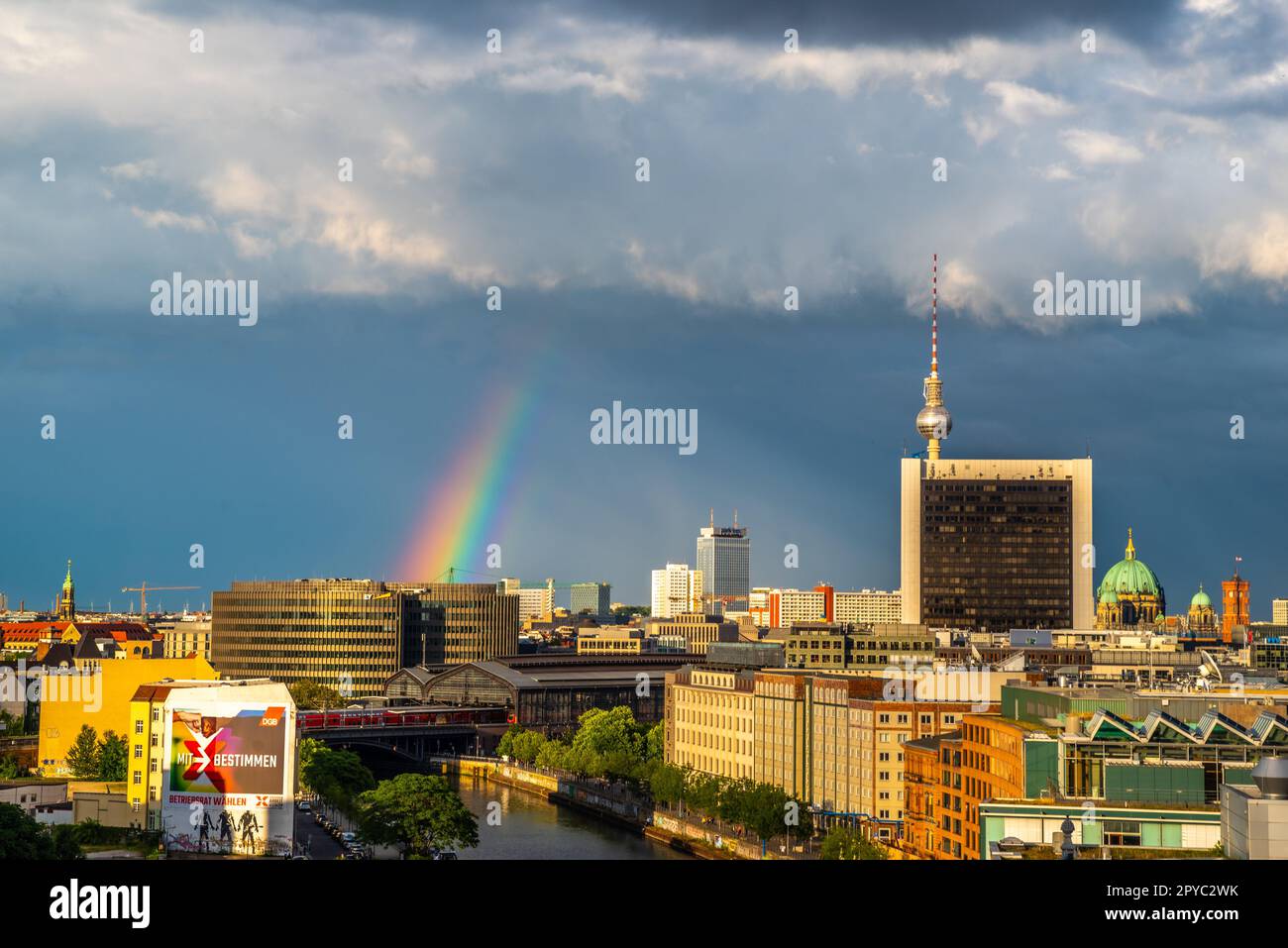Rainbow over the city of Berlin in Germany Stock Photo - Alamy