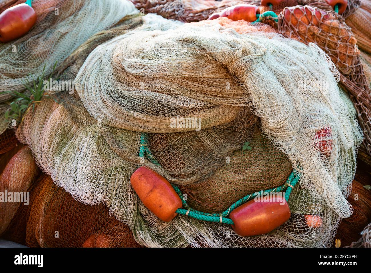 Colorful fishing nets on Marina Corricella on Procida Island, Bay of ...