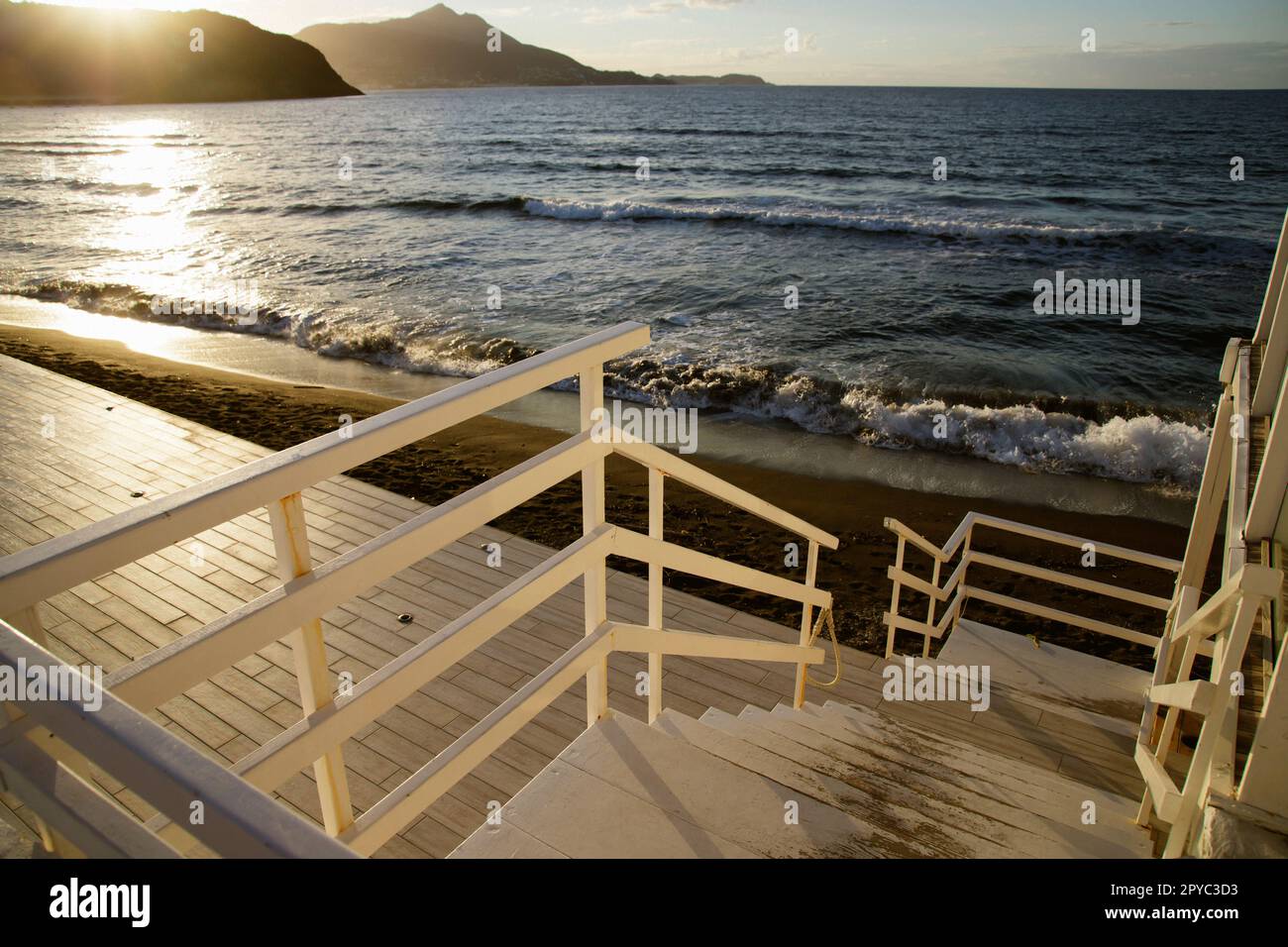 White wooden steps to the beach, Procida, Italy Stock Photo - Alamy