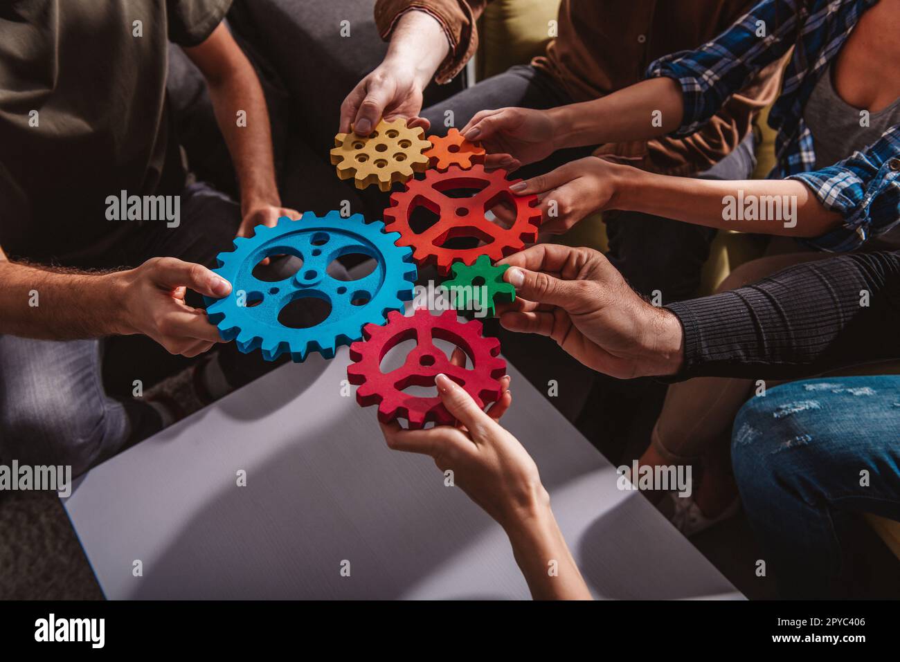 Business team connect pieces of gears. Teamwork, partnership and ...