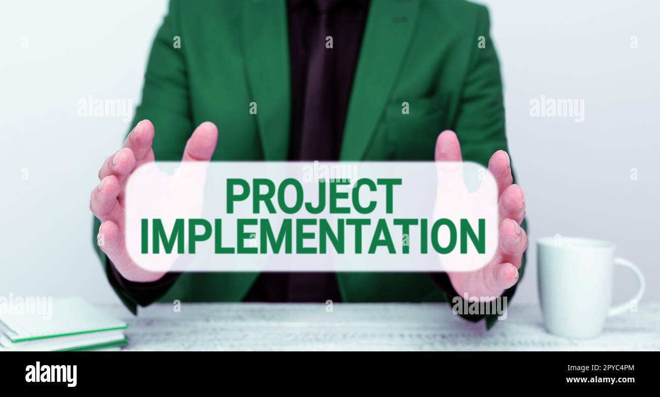 Hand writing sign Project Implementation. Business overview paying for ...