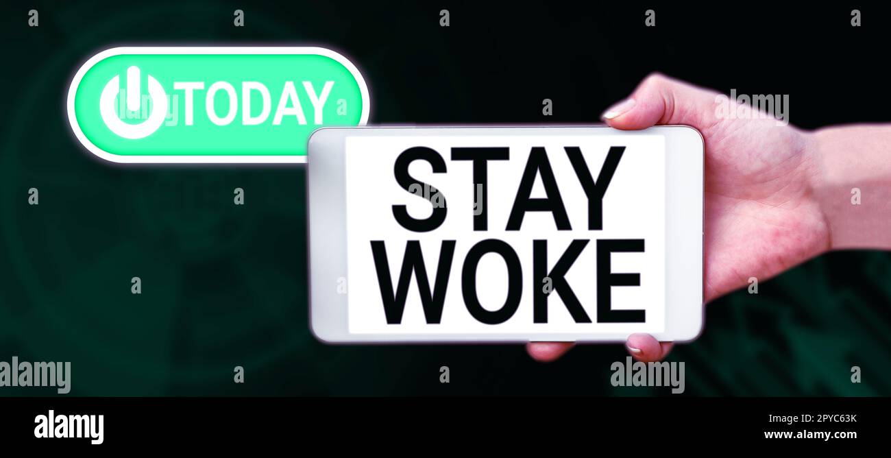 Hand writing sign Stay Woke. Business overview being aware of your ...