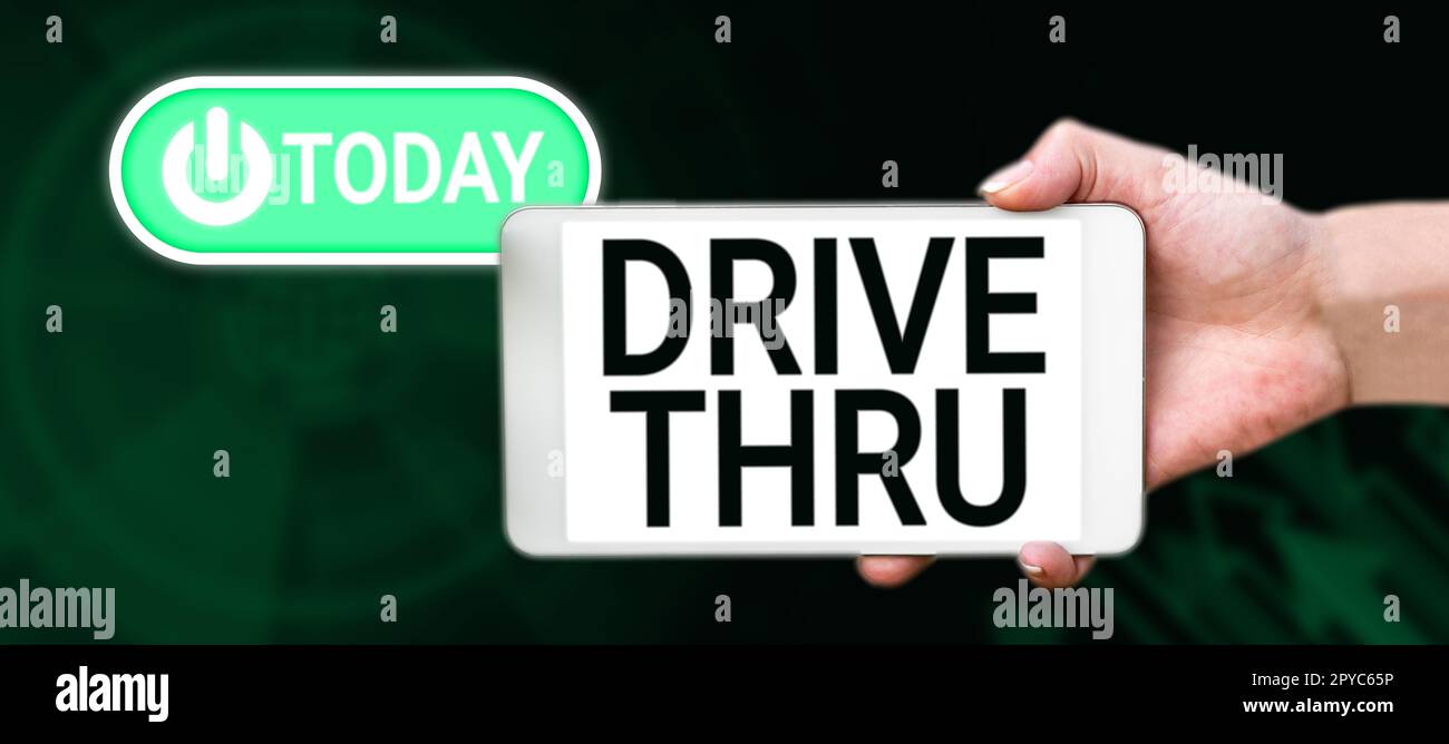 Text sign showing Drive Thru. Word Written on place where you can get ...