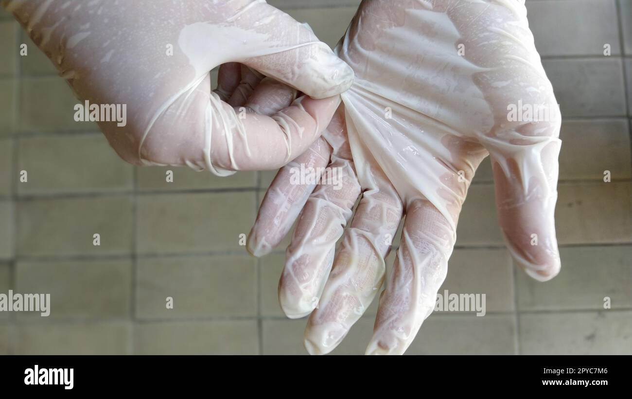 Hands in surgical gloves. Gestures, rubbing hands. Hand Wearing Medical ...