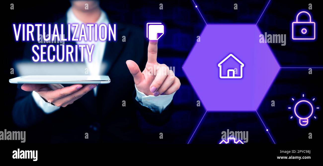 Hand writing sign Virtualization Security. Word Written on application of virtual environment to ...