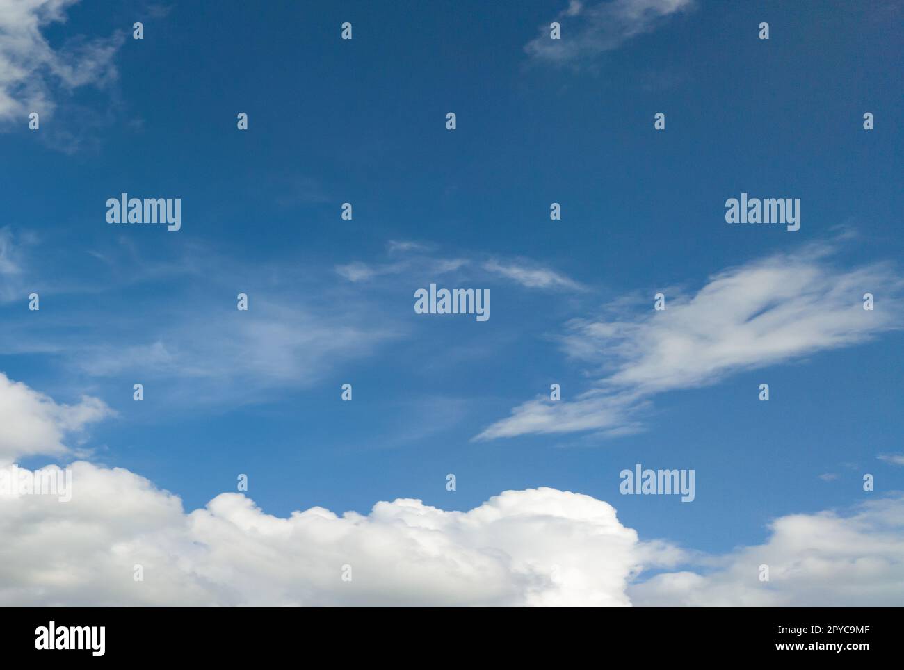 Bright blue stratosphere empty sky with some clouds Stock Photo - Alamy