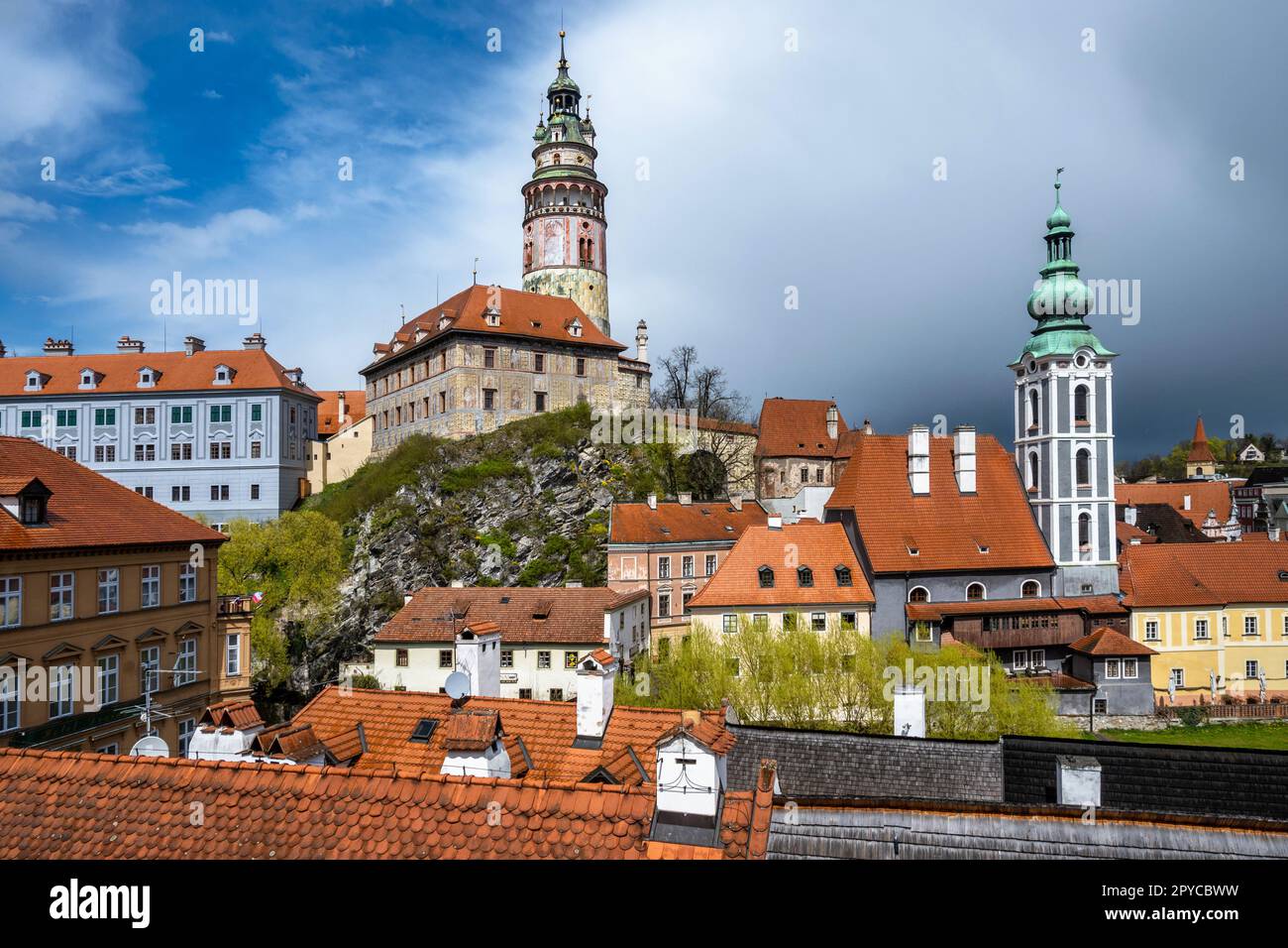 Cesky Krumlov, historical area of castle with two towers on rocky hill ...