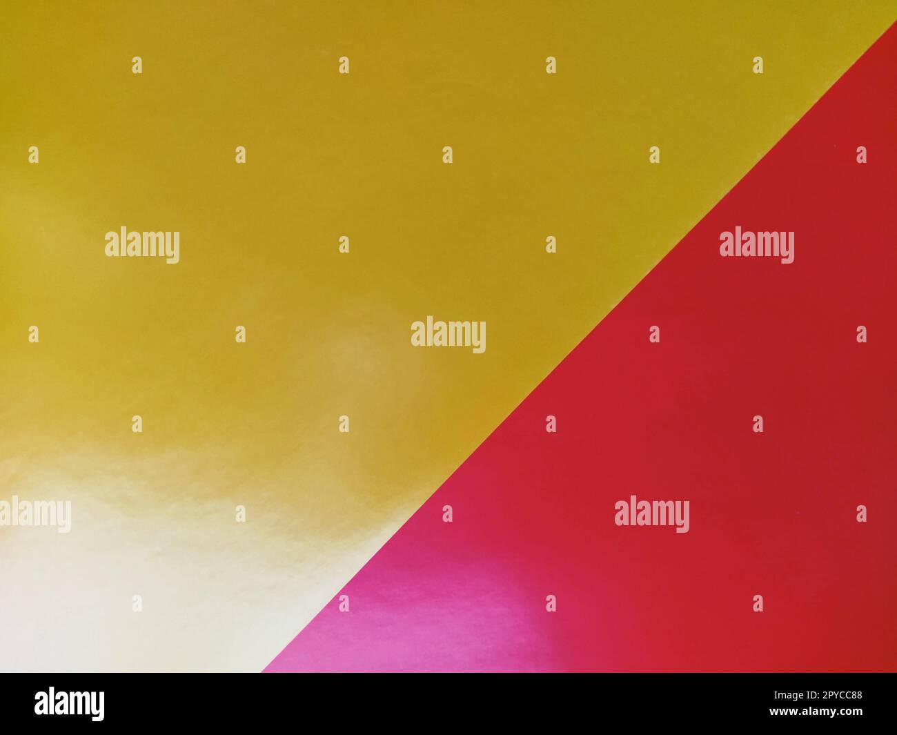 Yellow-pink bright background. Diagonally laid sheets of colored paper ...