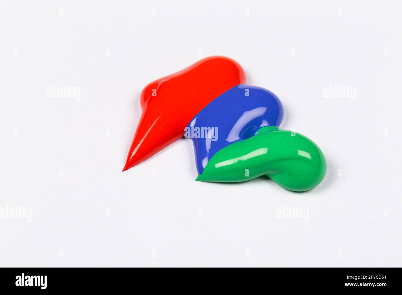 Acrylic green blue red paint on white paper Stock Photo - Alamy