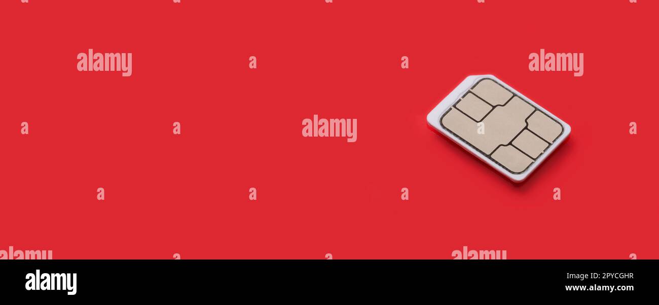 SIM Card - Isolated on red background. banner size, panorama, with ...