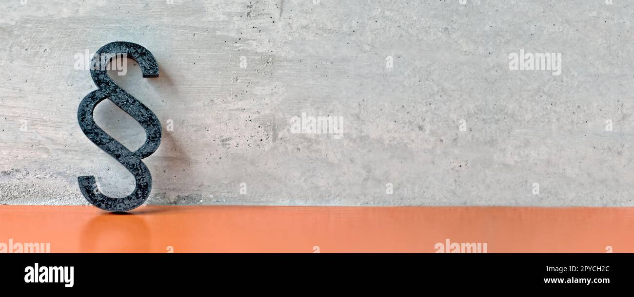 Paragraph - section sign in front of a concrete wall. Panoramic image ...