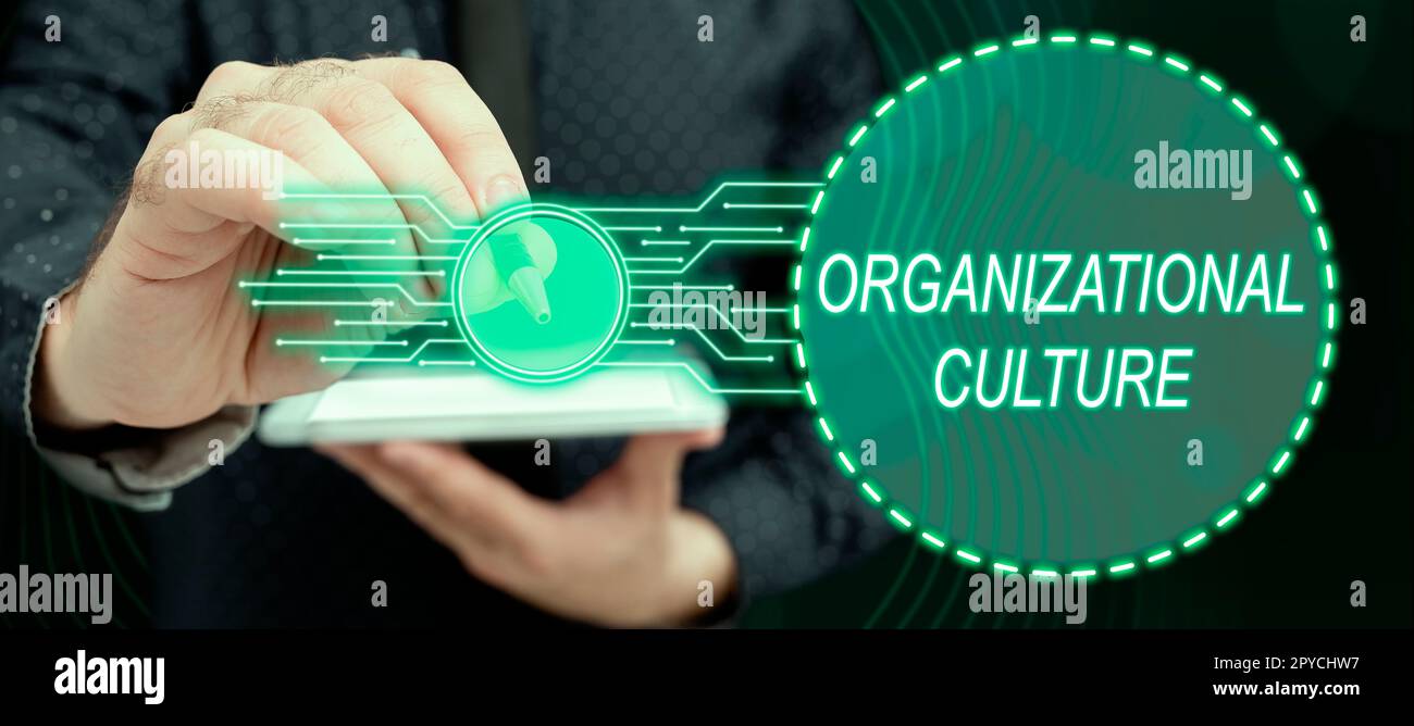 Hand writing sign Organizational Culture. Concept meaning the study of ...
