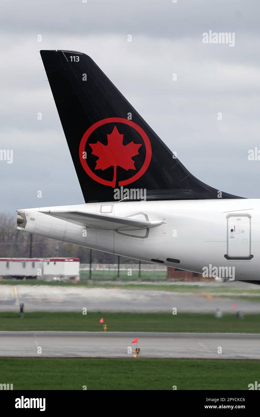 Tail section of an Air Canada passenger jet Stock Photo - Alamy