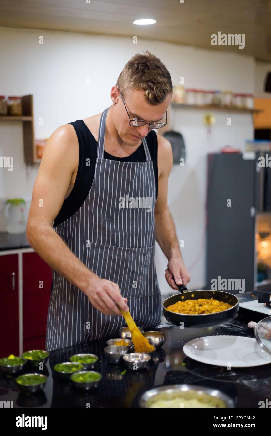 Indian chef serving food in restaurant hi-res stock photography and ...