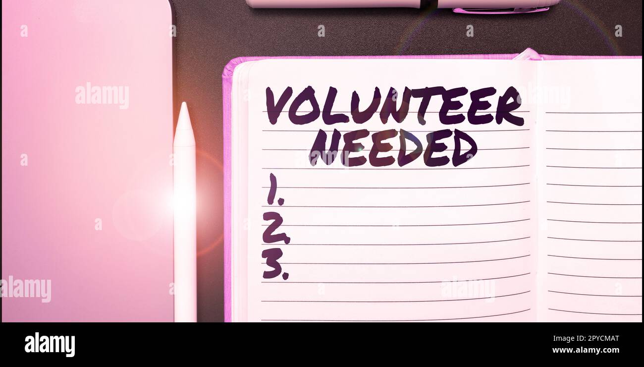 Text sign showing Volunteer Needed. Word for Looking for helper to do ...