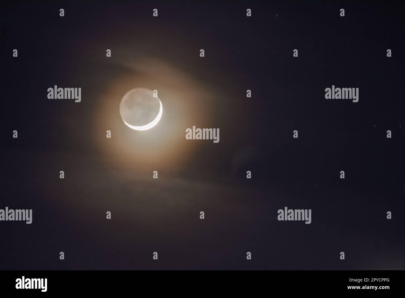 moon with a colorful glow at the night sky Stock Photo - Alamy