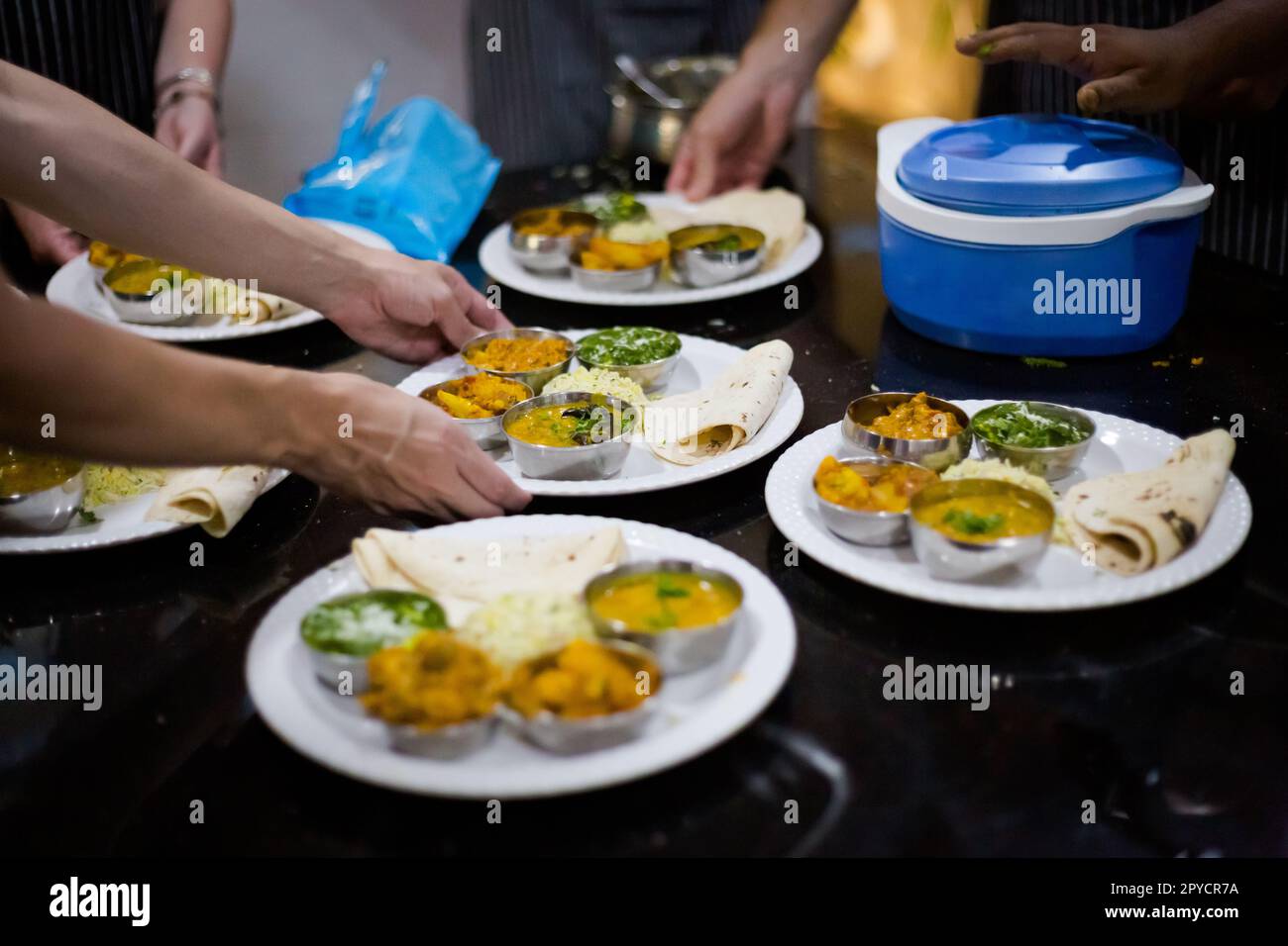 Indian chef serving food in restaurant hi-res stock photography and ...