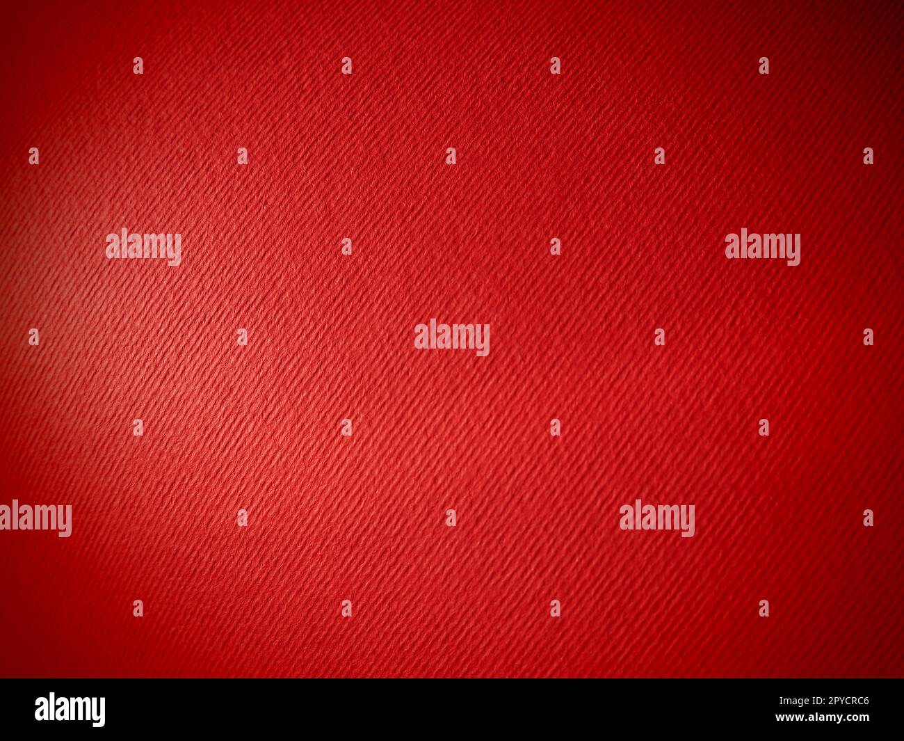 Abstract red background with texture. Close-up of paper surface with ...