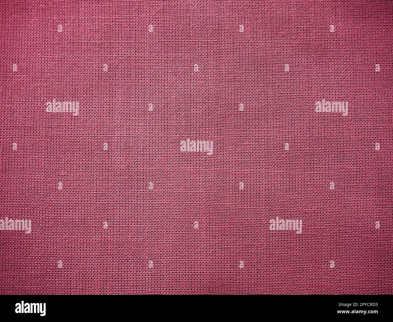 Cloth close-up. Interlacing of threads. A piece of pink fabric. Fabric ...