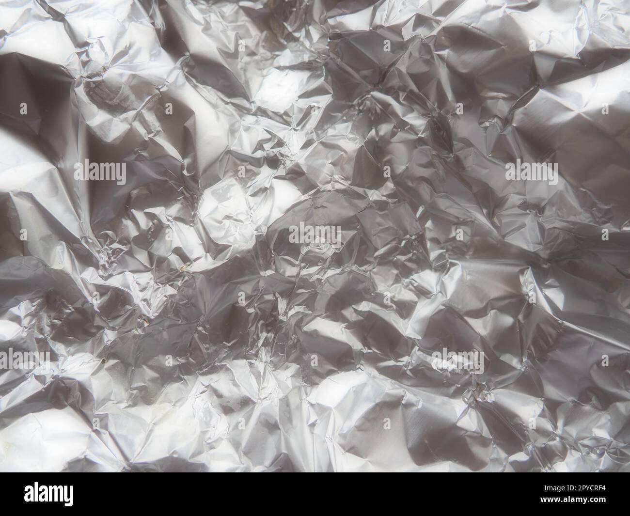 foil close-up. Aluminum silver crumpled foil. Abstract metallic ...