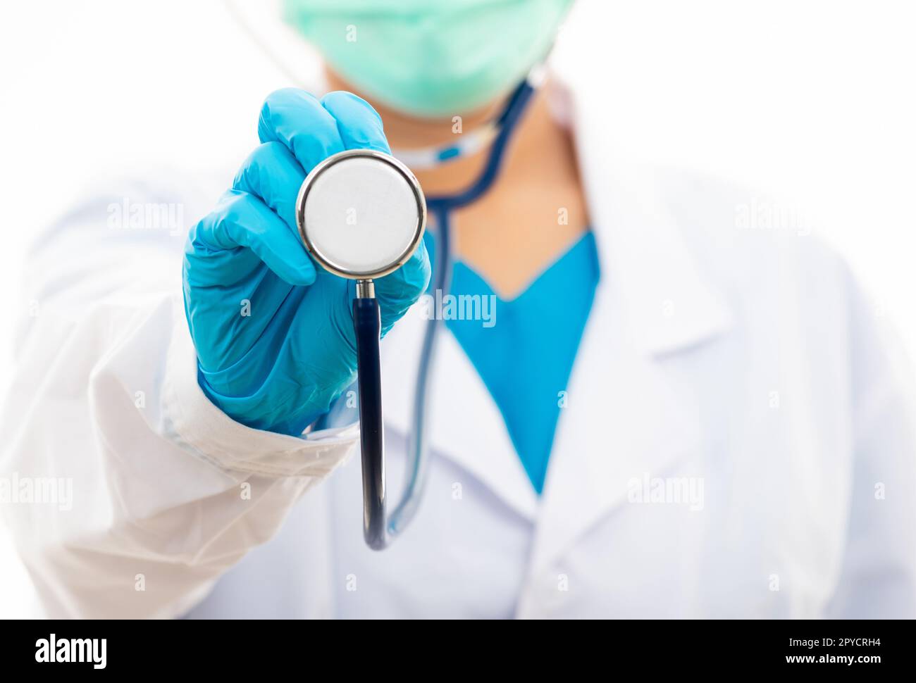 Doctor in white holding hi-res stock photography and images - Alamy