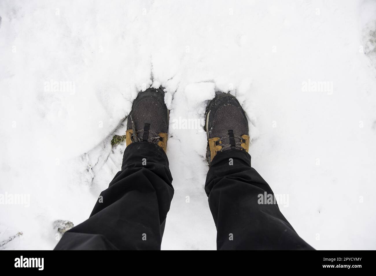 Male feet walking in snow hi-res stock photography and images - Alamy