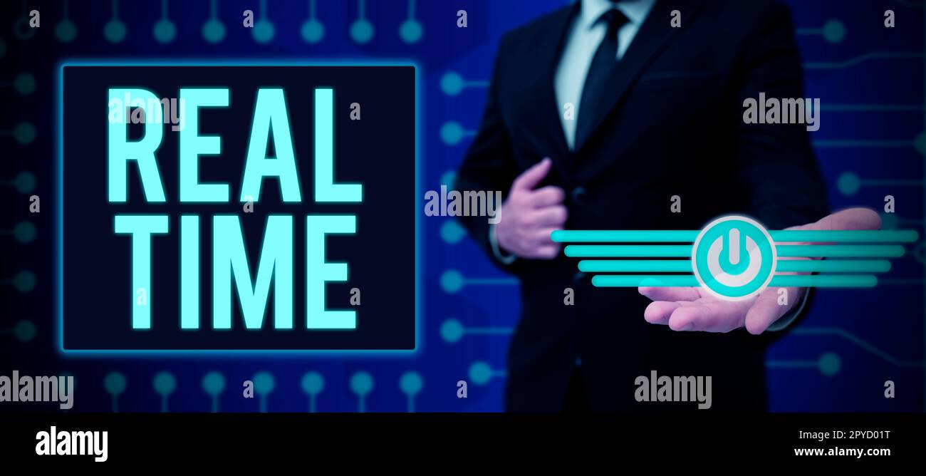 Hand writing sign Real Time. Business overview the actual time during ...